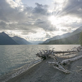 How to Create Light Rays through Clouds in Photoshop - PHLEARN